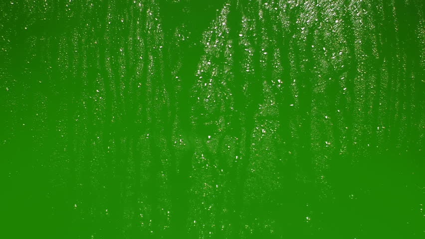 Rain Drops On Glass. Green Stockvideoklipp på (helt royaltyfria ...