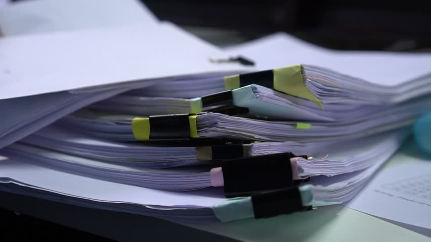 Stock video of businessman searching documents files or information ...