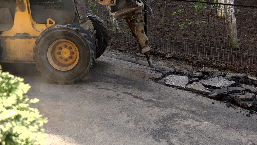 Asphalt Cutting With Diamond Blade. Construction Site. Concrete Cutter ...