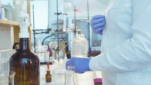 Titration Stock Video Footage - 4K and HD Video Clips | Shutterstock