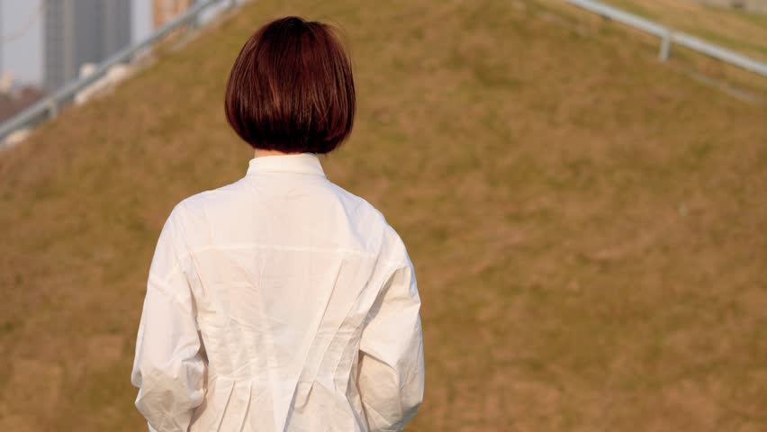 cute-asian-model-looking-back-and-smiling image - Free stock photo ...