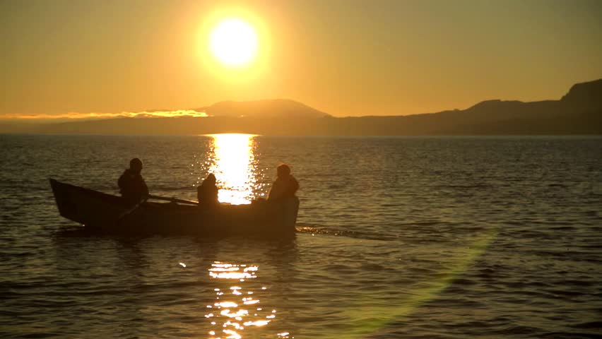 Stock video of paddling boat at the sunset. rowing boat | 10566872 ...