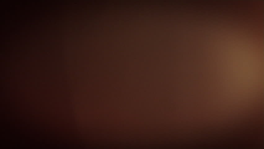 Subtle Light Leak On Black Background, Moving Lens Flare. Red - Orange ...