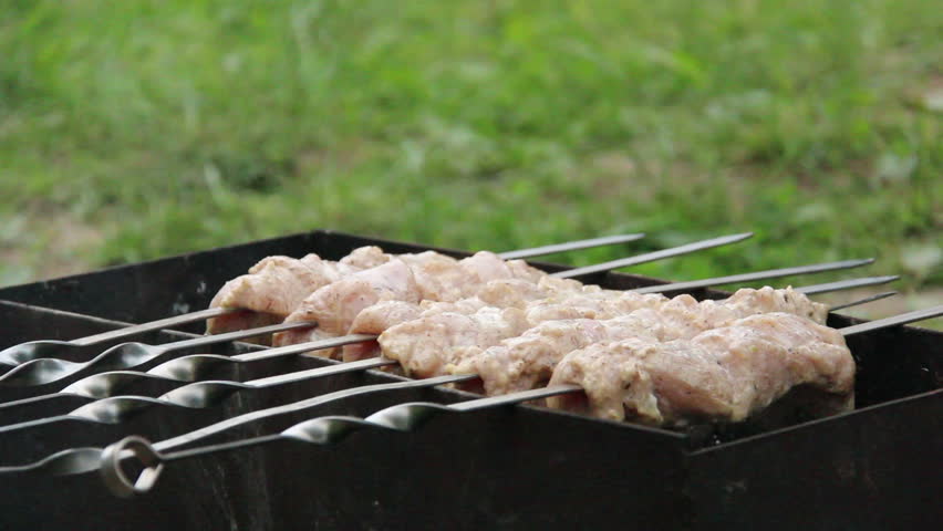 Beef And Beef Steak,sausage And Chicken Leg On Swaying Schwenker Grill ...