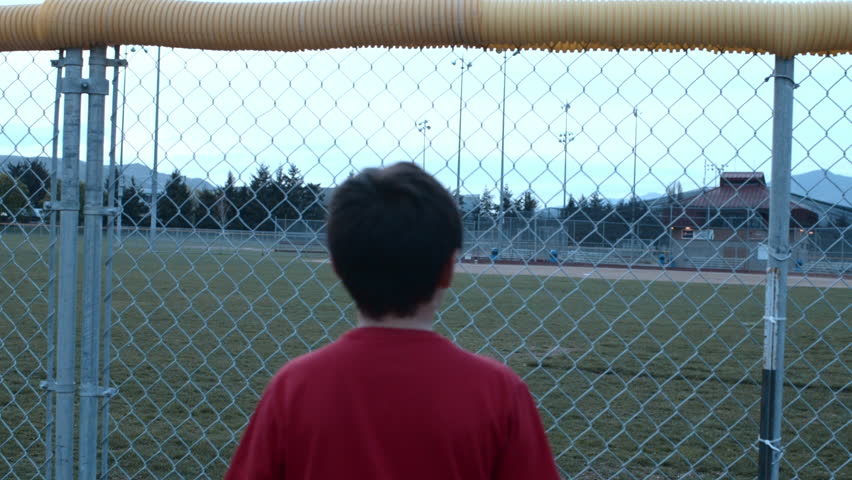 Sad Boy Looks at Baseball Stock Footage Video (100% Royalty-free ...