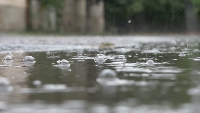 Rain Falling In The Puddle And Create Bubbles That Burs,raindrops ...
