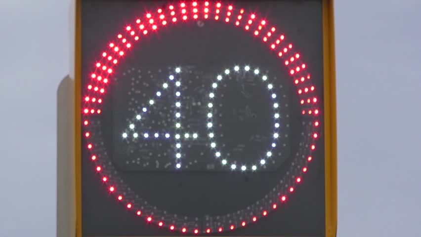 Stock Video Clip of Close up flashing digital speed limit sign ...