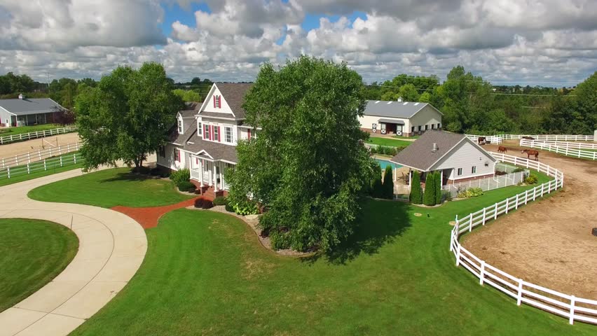Stock video of country ranch, mansion with horse barns,pens,pool ...
