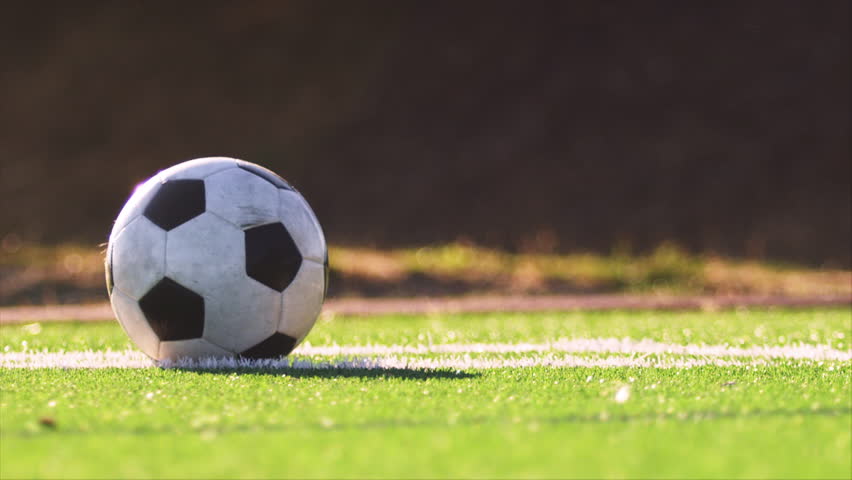 Stock Video Clip of Close up of a soccer ball being | Shutterstock