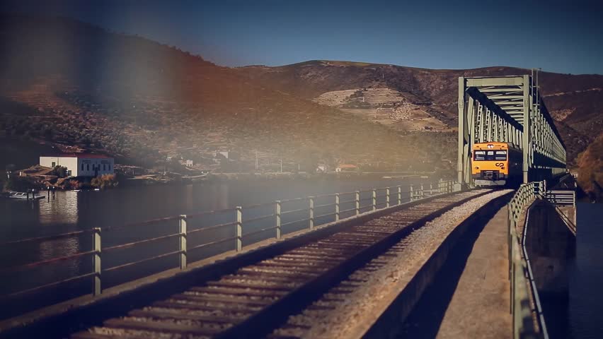 Stockvideo-Clip von Cinemagraph Loop - Orange white train travelling ...