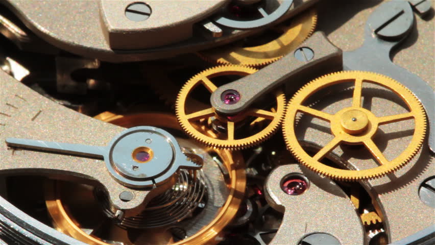 A Slow Panning Macro Shot Of Cogs Spinning Inside A Watch. Stock ...