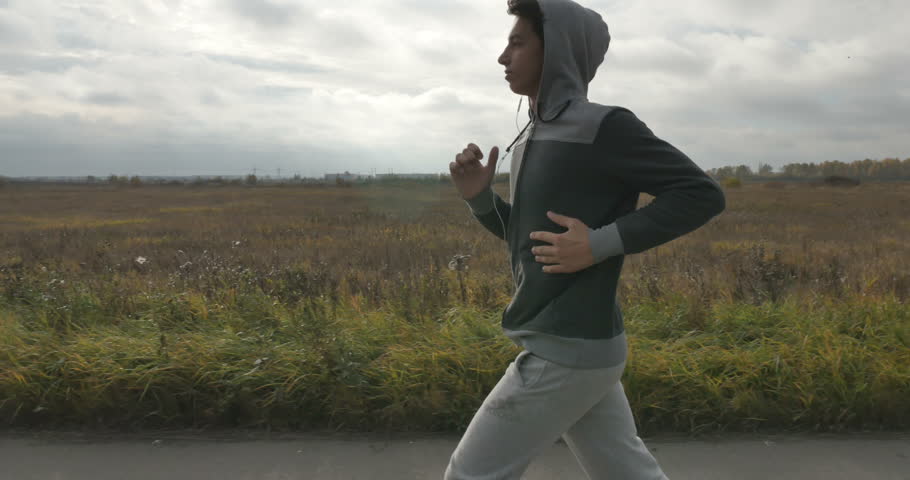 Running Man. Shooting with a Stock Footage Video (100% Royalty-free ...