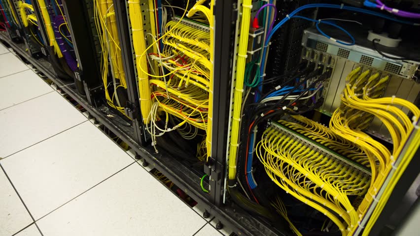 Engineer Closes Door Of Server Rack With Many Network Equipment And ...