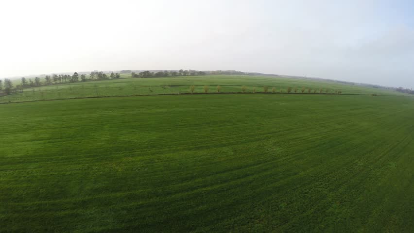 Bird view flying slowly over grasslands landscape için Stok Video Klip ...