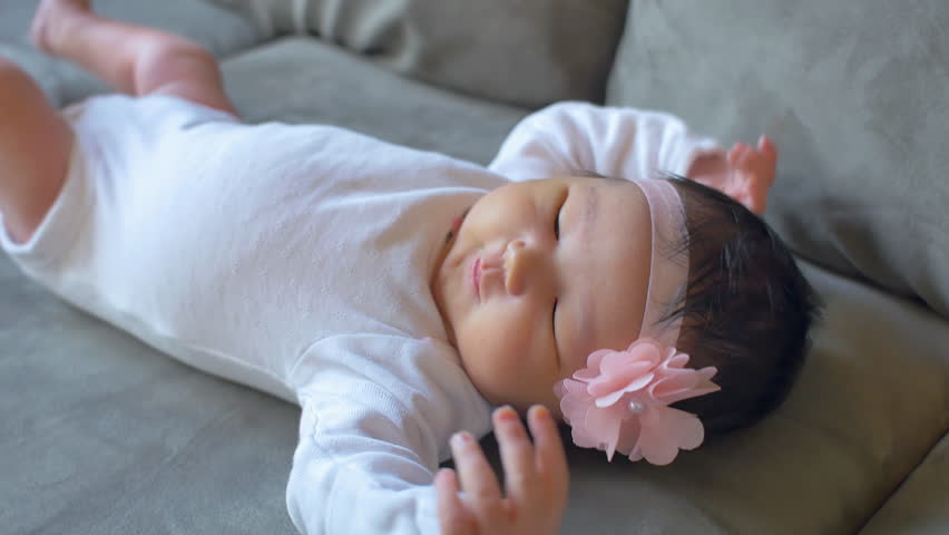 A Wiggling Newborn Baby Laying Stock Footage Video (100% Royalty-free ...