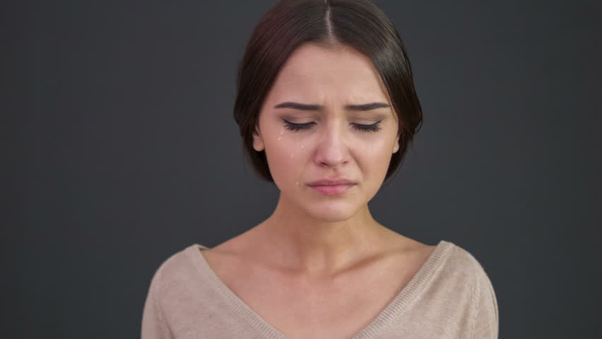 Emotional Person. Young Crying Woman Tries To Cry Less And Calm Down ...