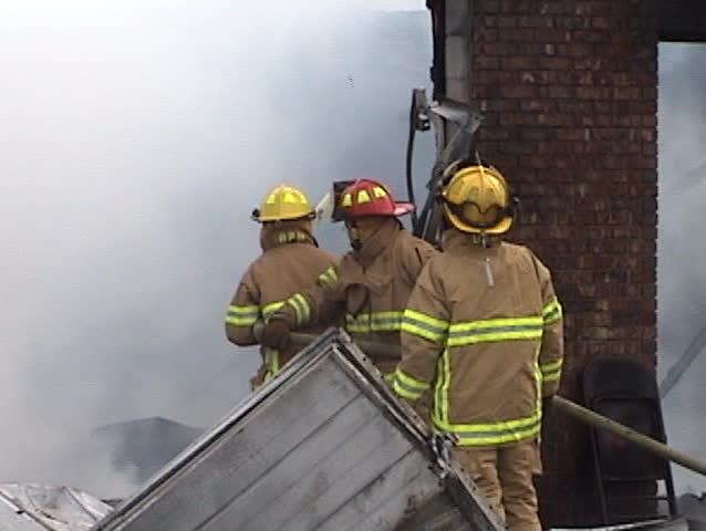 Firefighters Hosing Down Hot Spots Stock Footage Video (100% Royalty ...