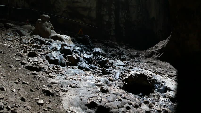 Bright Grotto Ceiling Opening, Dark Walls And Narrow Passage, High ...