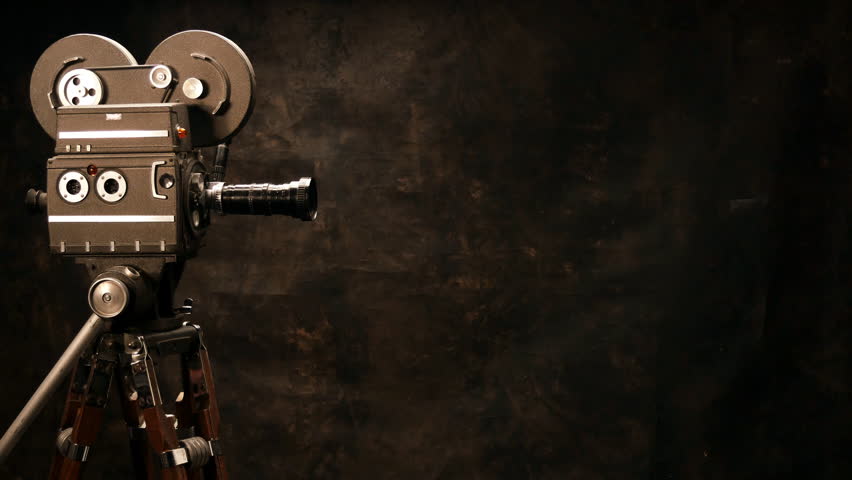Vintage Hollywood Movie Camera In Front Of Black Backdrop. Suitable For ...