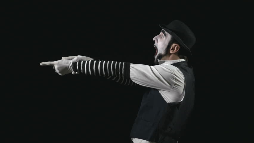 Young Funny Mime Behind An Invisible Glass Box Or Wall Stock Footage ...