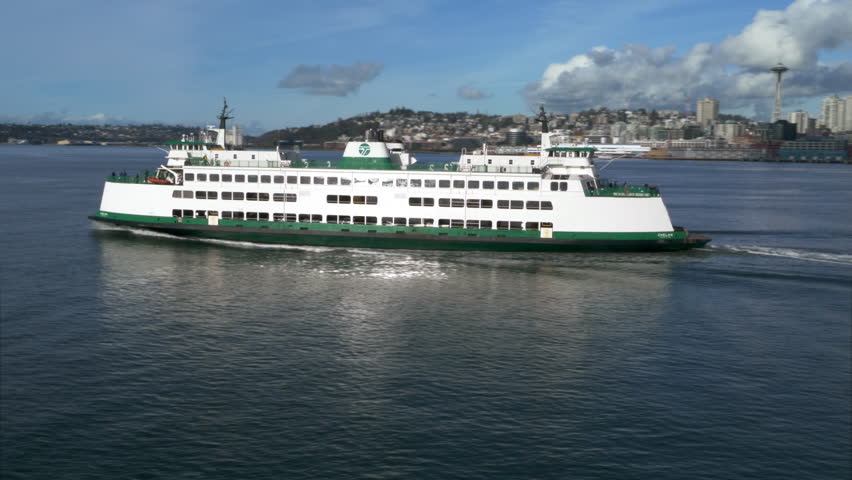 Ferry Boat Traveling Along Waterfront Of Seattle Shot In 4k24p Seattle Wa Jan 24 2016 Stock