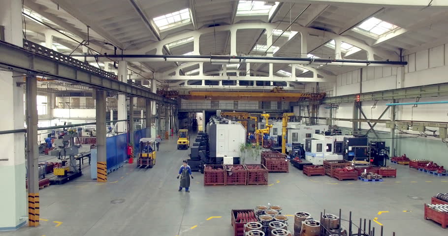 Stock Video Clip of Inside of a industrial factory. Aerial shoot ...