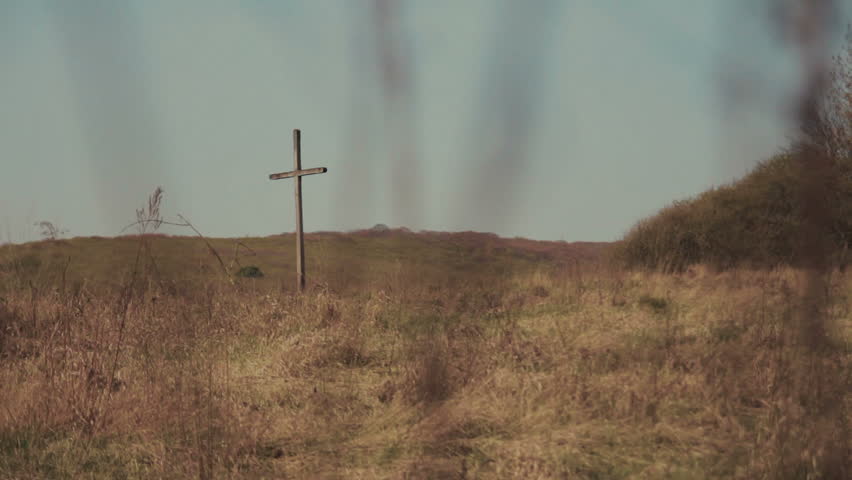 Single Wooden Cross In Grass Field Stock Footage Video 15907654 ...