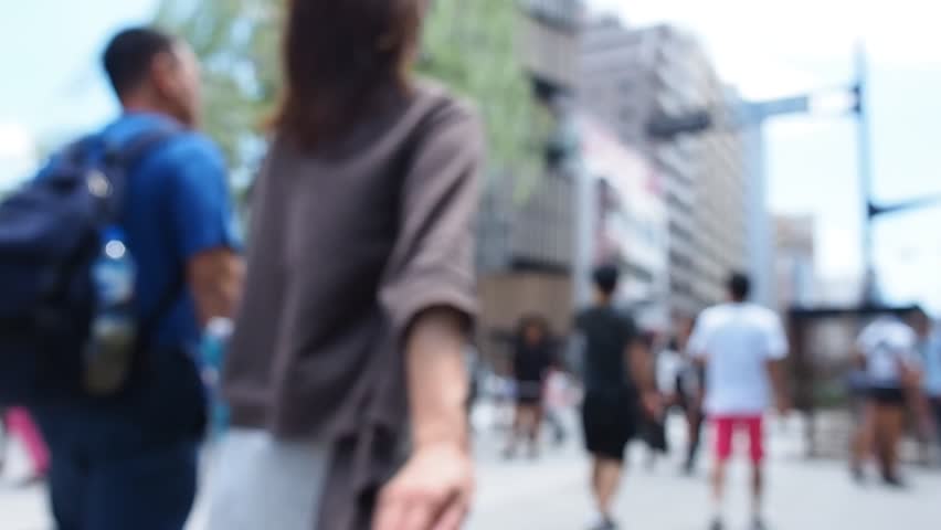 Slow Motion Of People Walking In The City. Urban Lifestyle Background ...