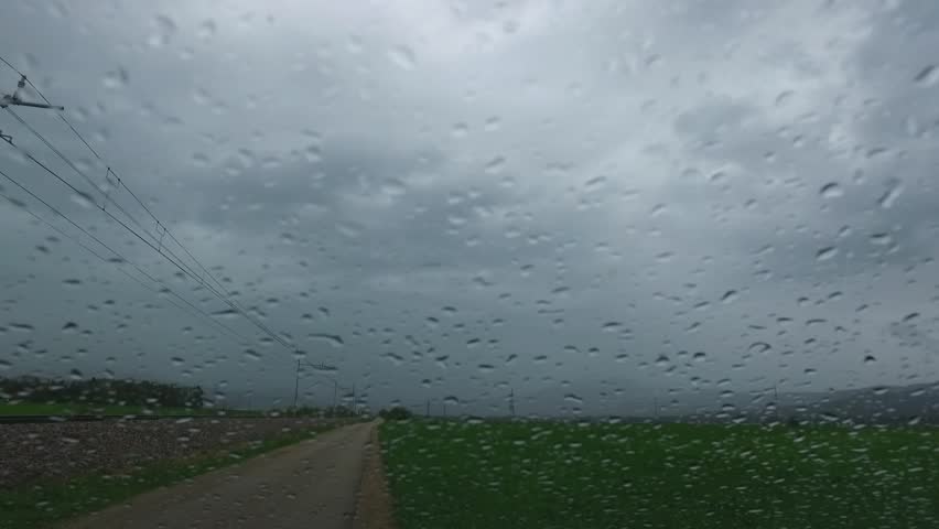 Stock video of stormy weather outside of car window. | 16383172 ...