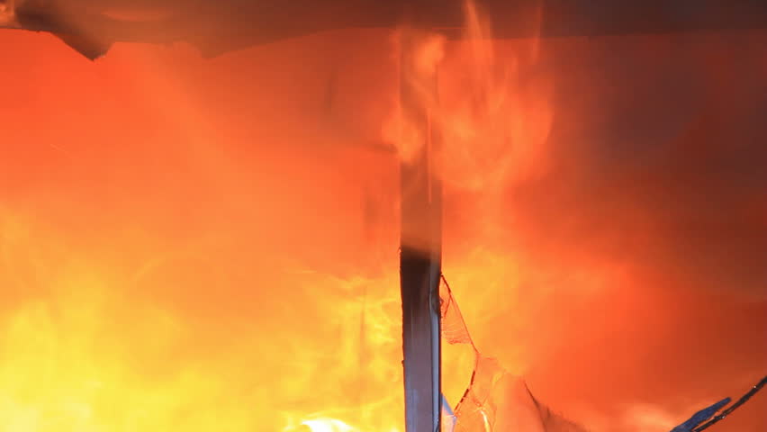 House Burning With Intense Flames After Dark. Flames And Smoke Coming ...