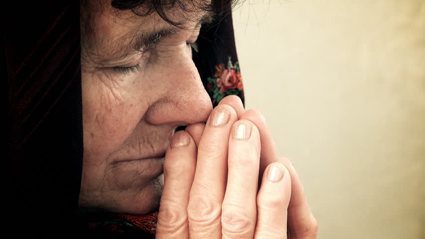 Closeup Portrait Of Old Woman Praying Deep In Prayer Stock Footage ...
