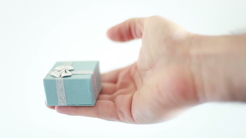 Stock video of hand giving a gift | 1853902 | Shutterstock