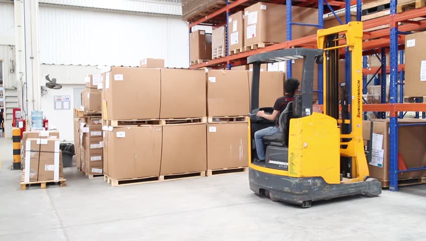 FACTORY WAREHOUSE - THAILAND , MAR 29 - 2016 : Fork Lift Truck Lifting ...