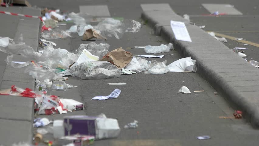 Trash in the Street. Wind Stock Footage Video (100% Royalty-free ...