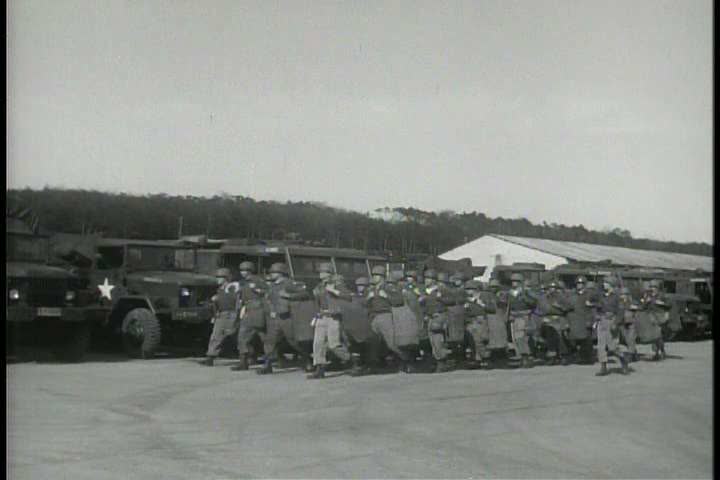 Vehicles Are Driven Out Of A Motor Pool To Be Used In A Practice Alert ...