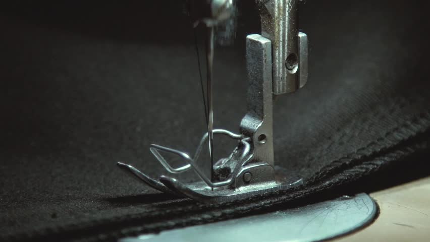 A Sewing Machine In Motion. Close-up Of Sewing Machine Needle Rapidly ...