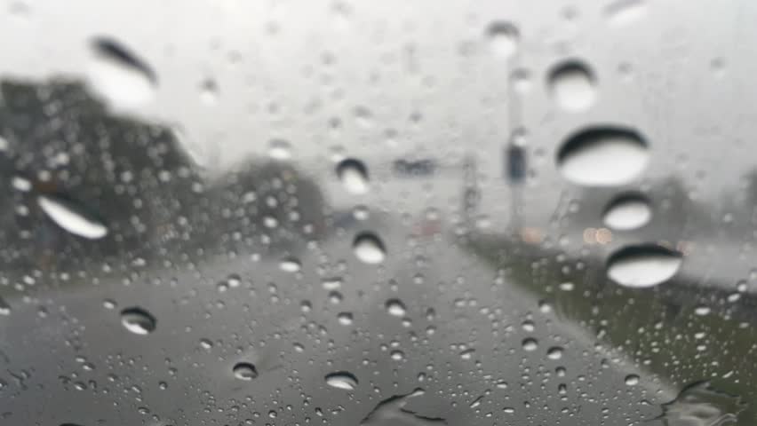 Rain Splatters Car Windshield During Stock Footage Video (100% Royalty ...