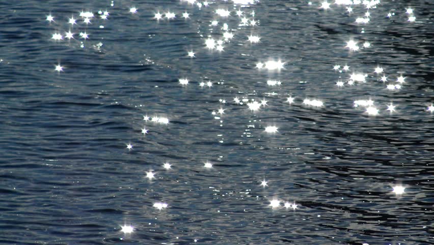 Scintillating Sun Reflections Create Diamond Stars On The Waves Near ...