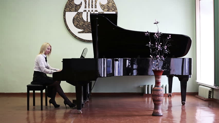 Beautiful Girl Musician Plays The Piano, Stage Performance Before The ...