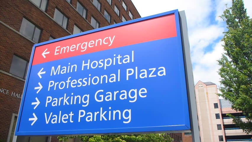 Hospital Entrance Exterior With Sign Pointing To Emergency, Main ...