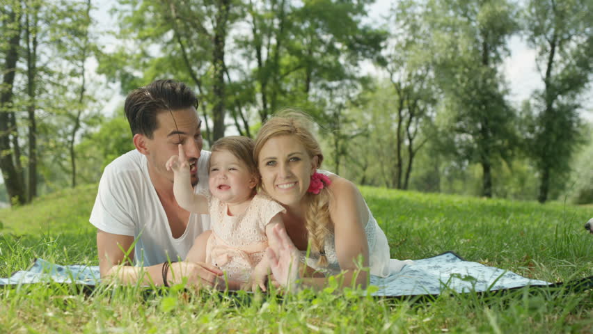 Happy Family Having Fun Outdoors In Spring Park Stock Footage Video ...