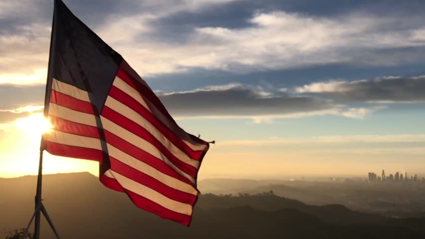 American Flag Blowing In The Wind In Slow Motion Stock Footage Video ...