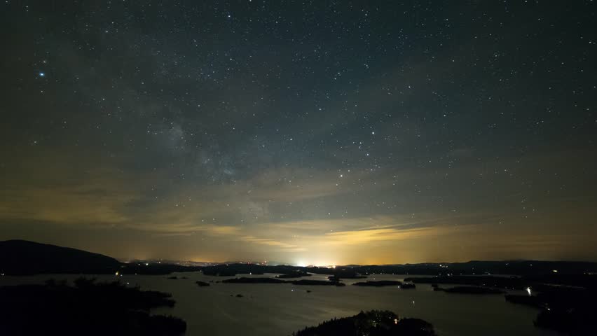 Stars Tracking Across The Night Sky Until Dawn (time Lapse) With Wispy ...