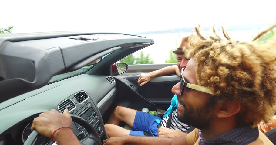 Black Handsome Man With Dreadlocks Driving His Friends In Convertible ...