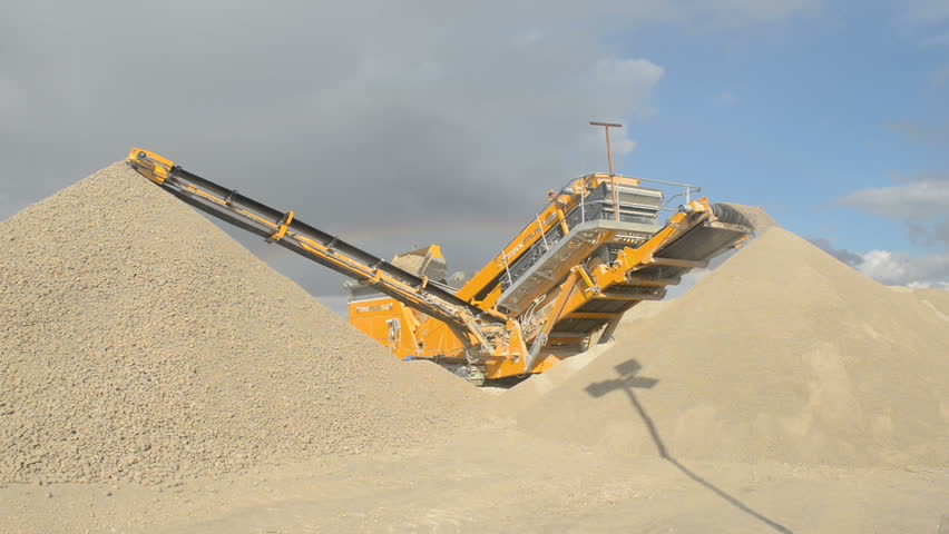 Detail Shot Of Machine For Crushing Stones At Sand And Clay Quarry ...