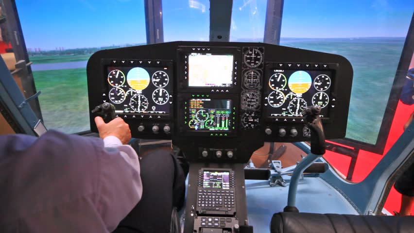 Pilot Operates Helicopter Simulator During Simulated Flight On ...