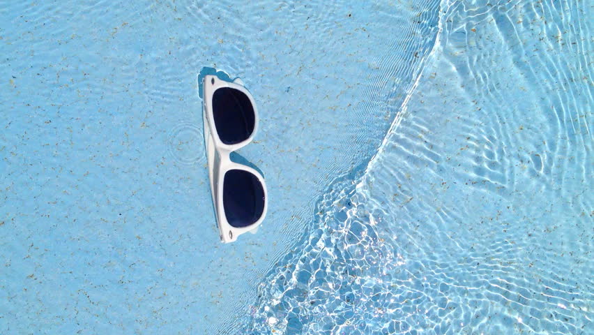 Sunglasses Floating On the Clear Stock Footage Video (100% Royalty-free ...