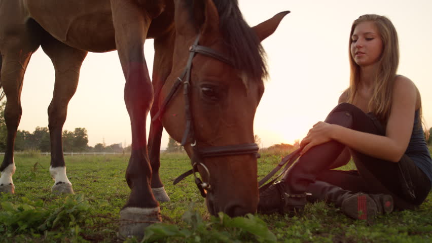 SLOW MOTION, CLOSE UP: Beautiful Young Caucasian Blonde Girl Bareback ...