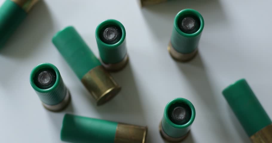 Shotgun Slug Shells Scattered On White Surface Stock Footage Video ...