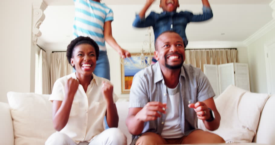 Stock video of kids and parents cheering while watching | 27268672 ...